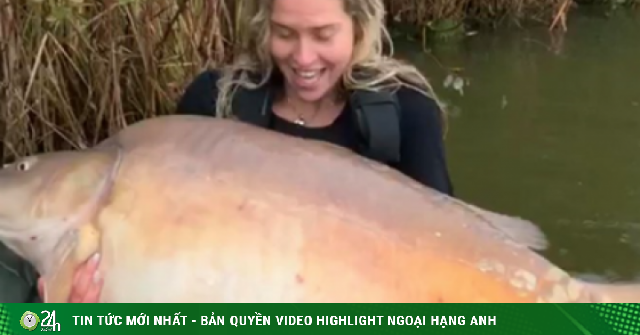 Nữ cần thủ câu được con cá chép khổng lồ nặng 41kg trong hồ